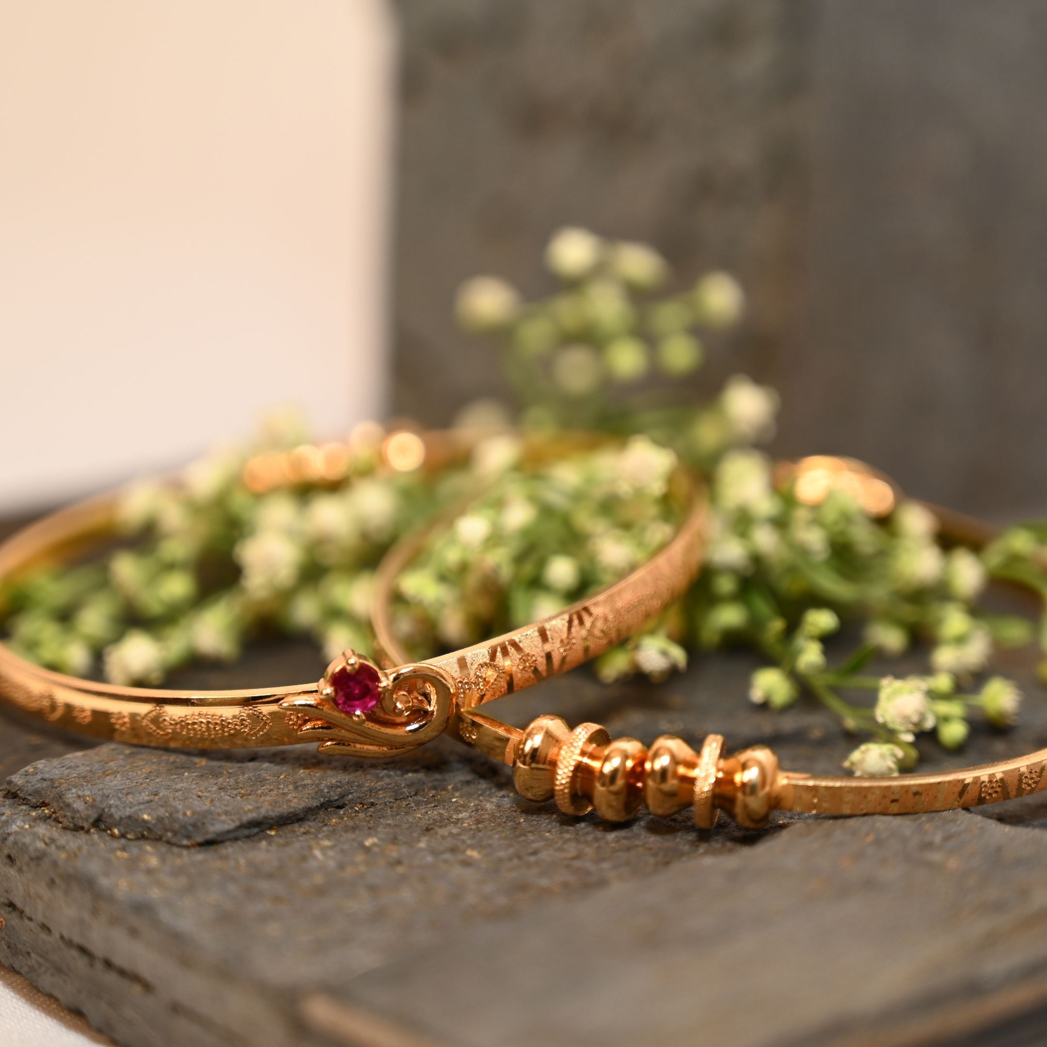 Kaakan Preet – Gold-Plated Minimal Ruby Swirl Bangle Set – Shrisakhi.com